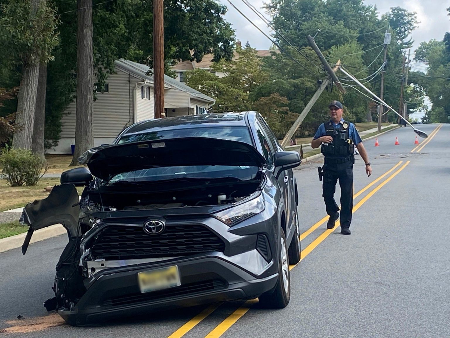 SUV takes out Two Utility Poles in Midland Park Crash