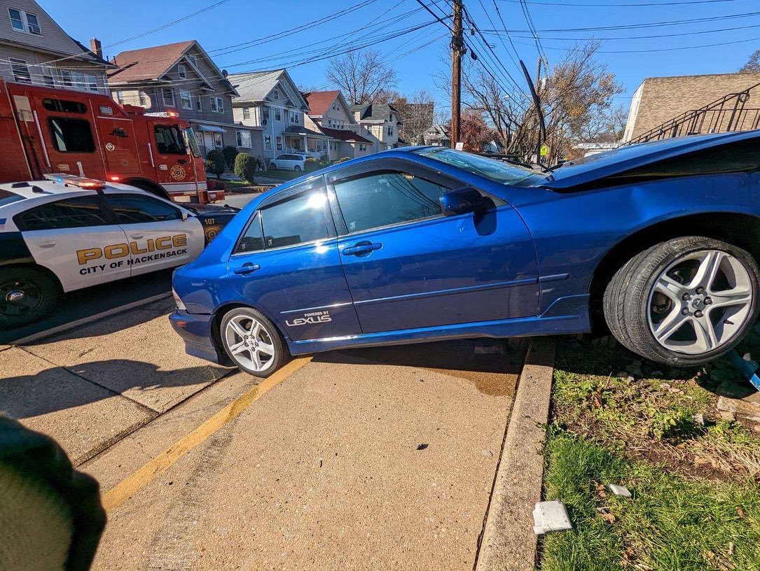 Vehicle loses Control Strikes Steps of Passaic Street Building in ...