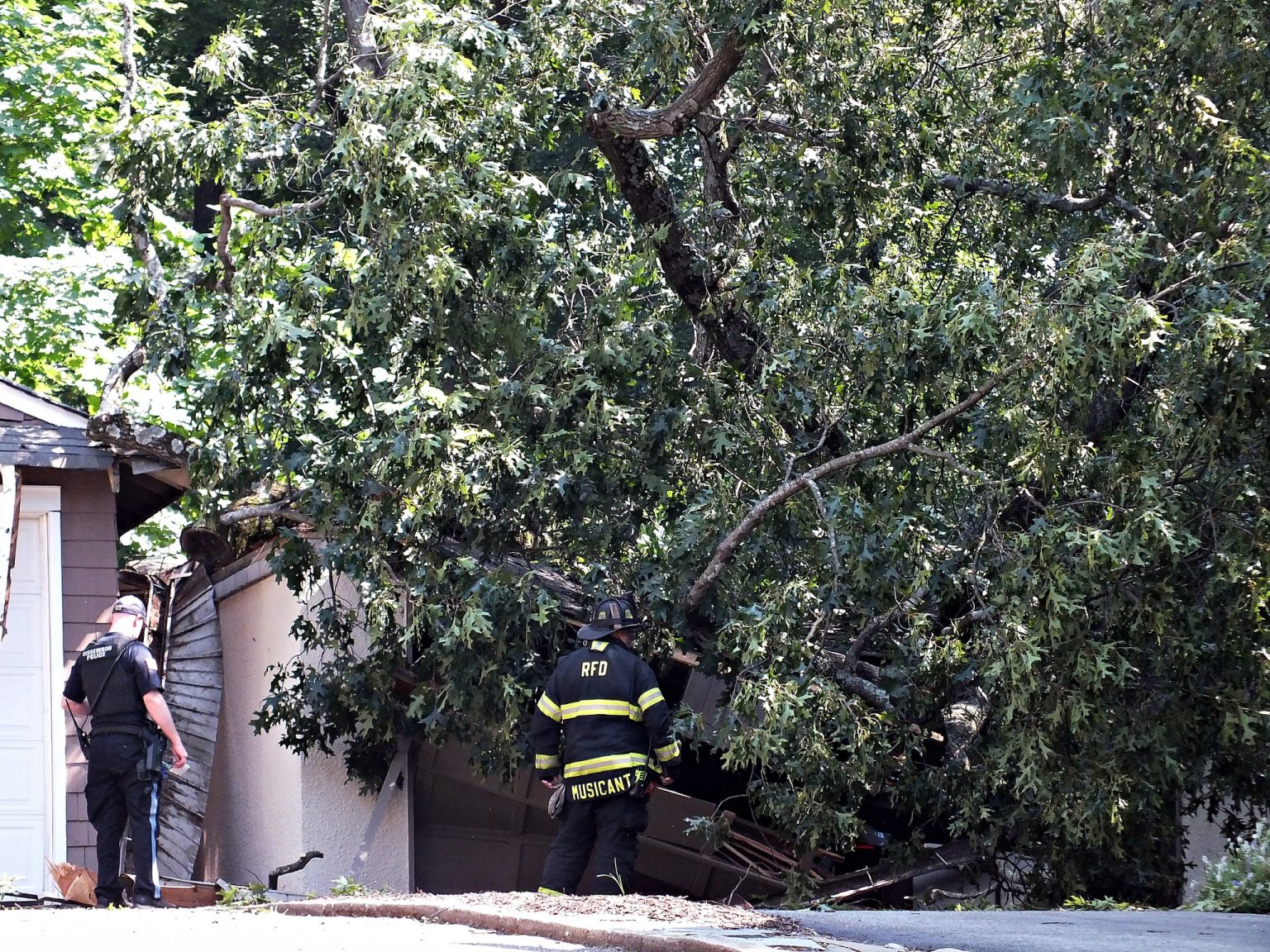 Falling Trees Flatten Ridgewood Garage, Crush Vehicle on Ridge Road ...